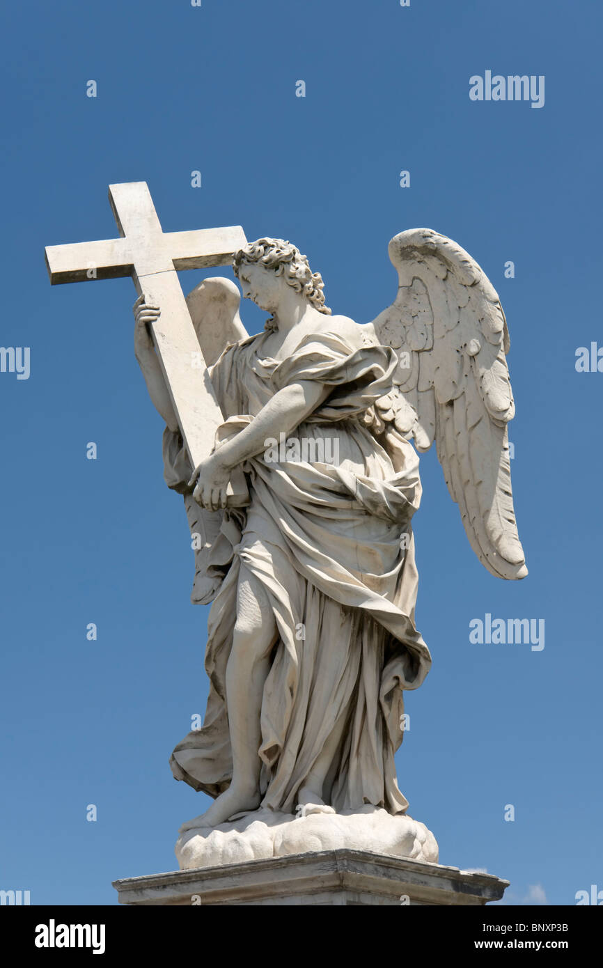 Angel with the cross Stock Photo - Alamy