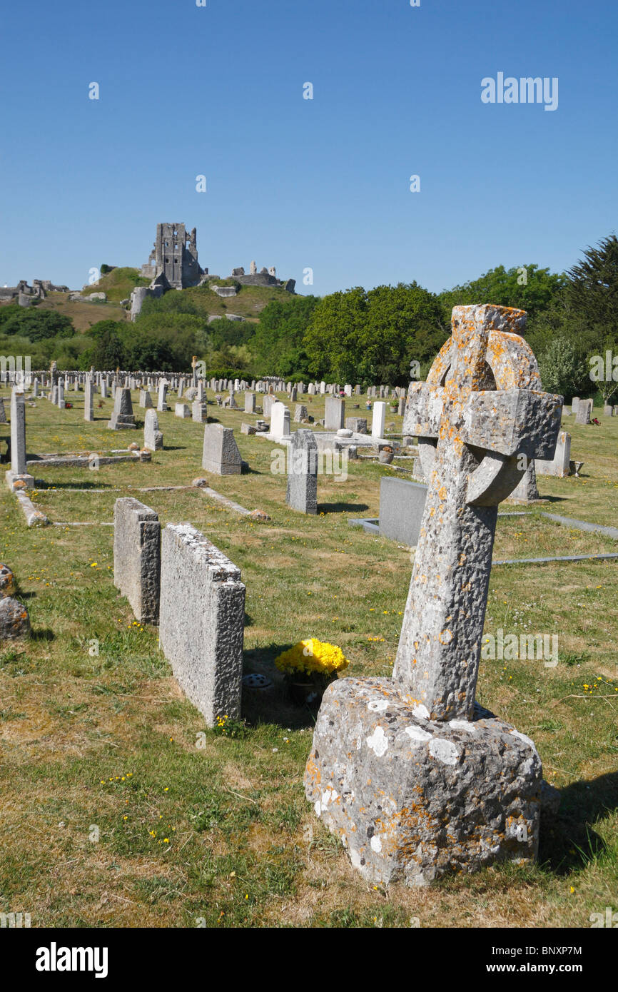 A view of Corfe Castle, Dorset, UK from a distant cemetery in the ...