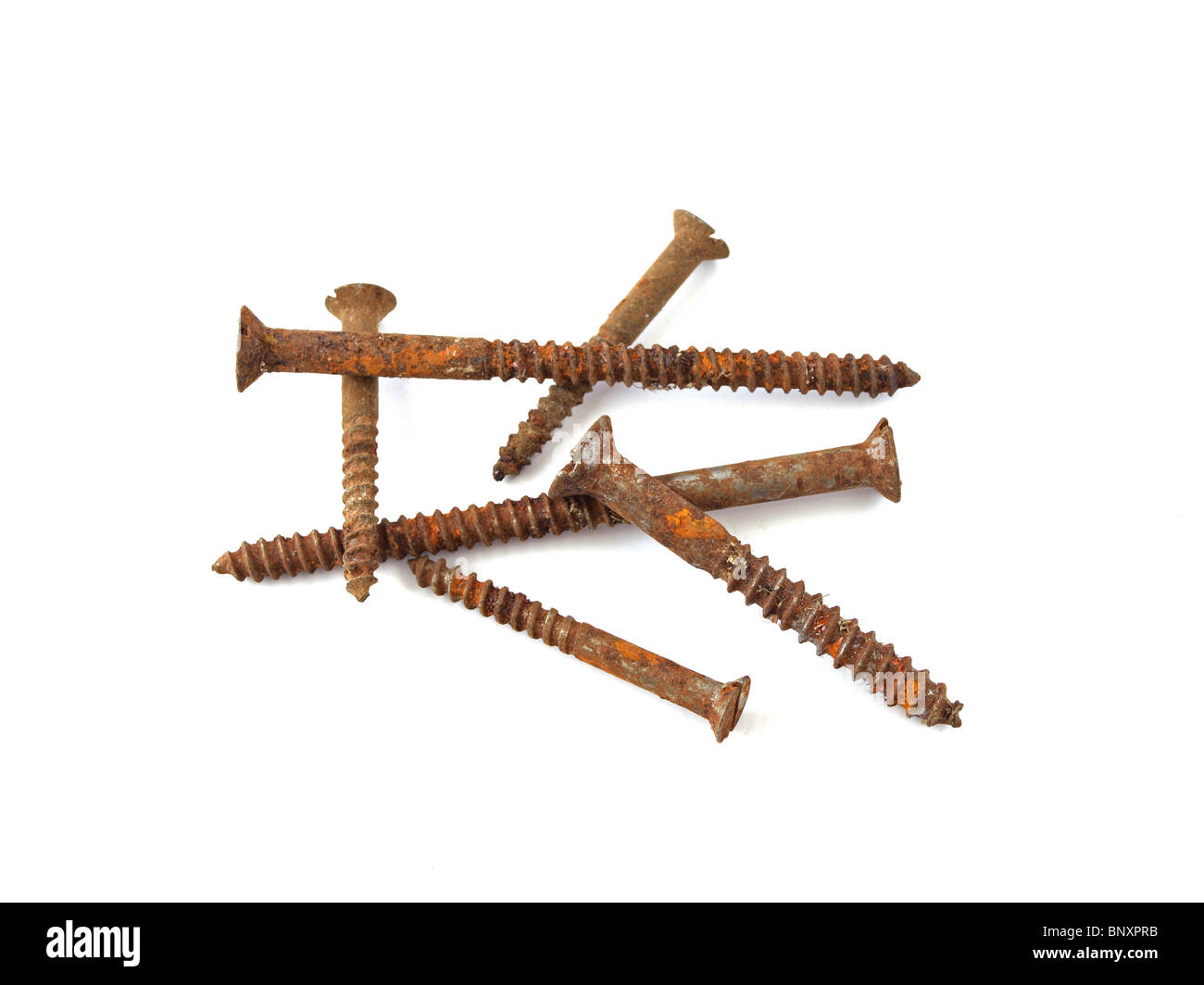 Rusty screws on a plain white background Stock Photo - Alamy