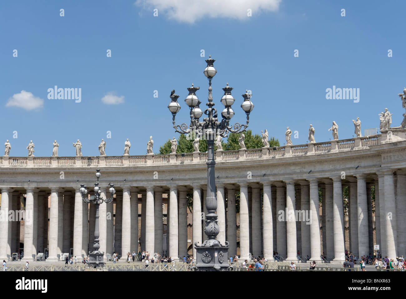 Saint Peter's square, street lamps and colonnade Stock Photo - Alamy