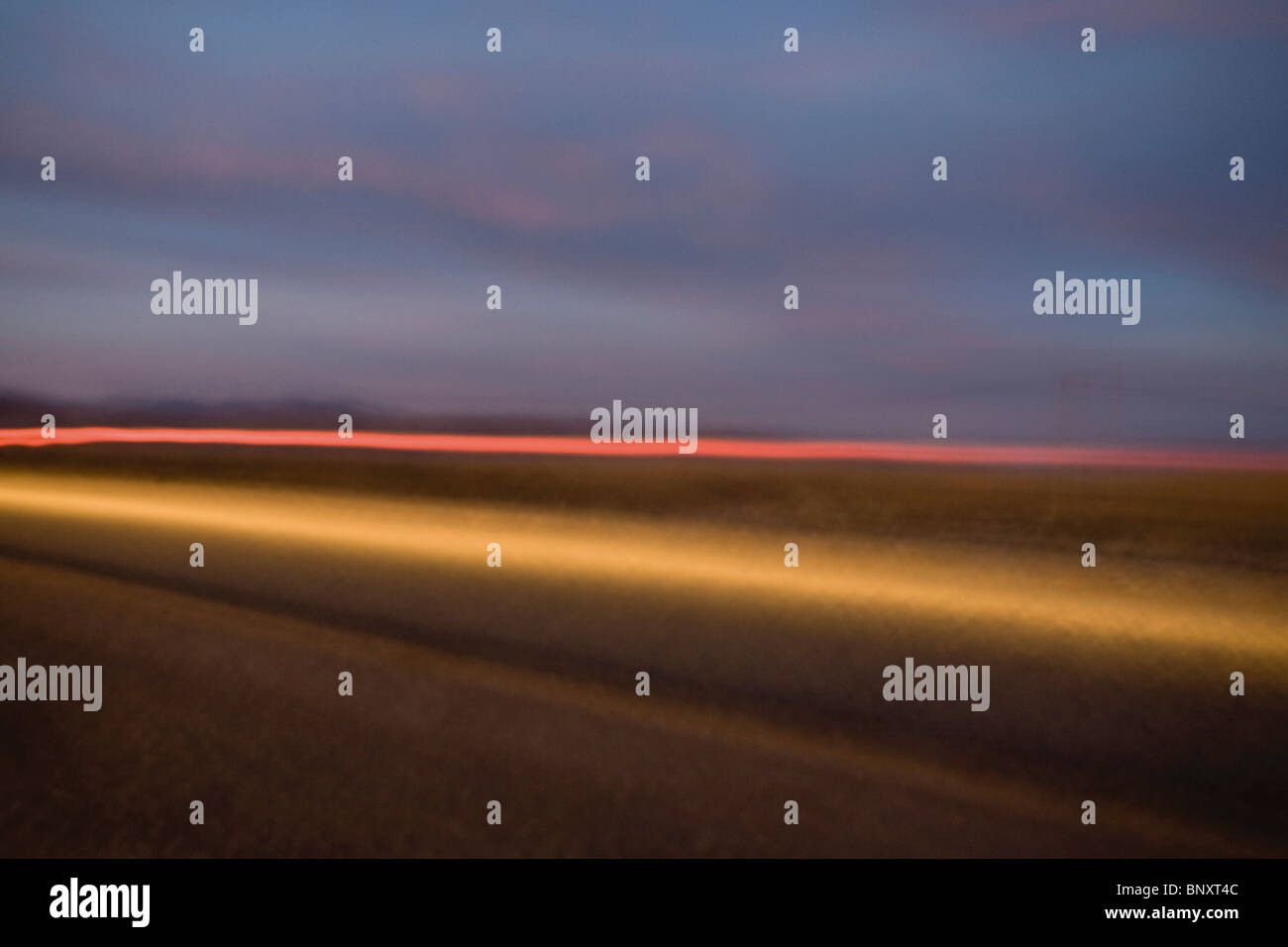 Light trails along highway Stock Photo - Alamy