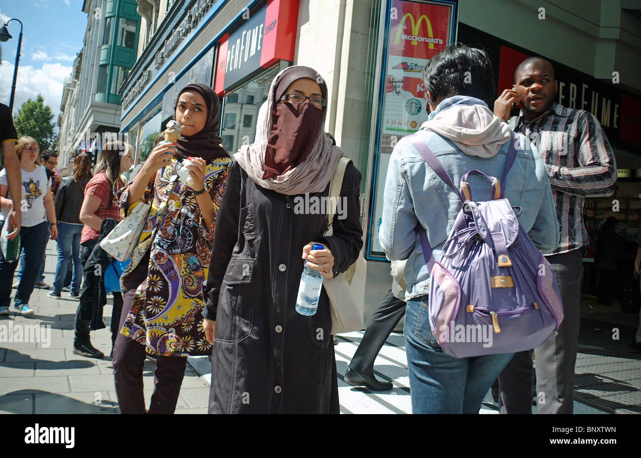 A bespeckled Muslim Woman on Oxford Street with a veil partly covering ...