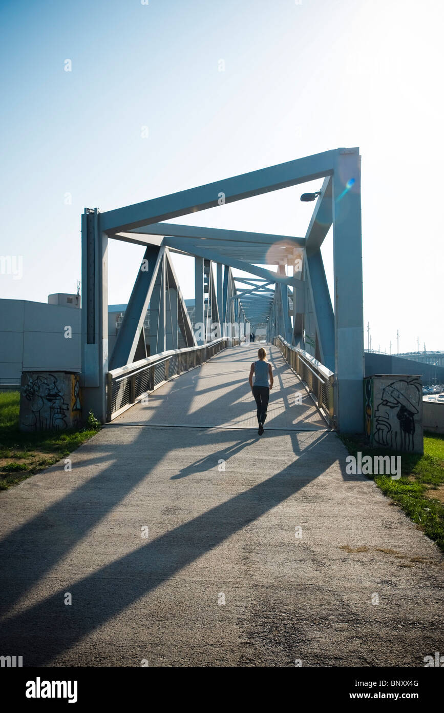 Pedestrian on crossing elevated walkway Stock Photo - Alamy
