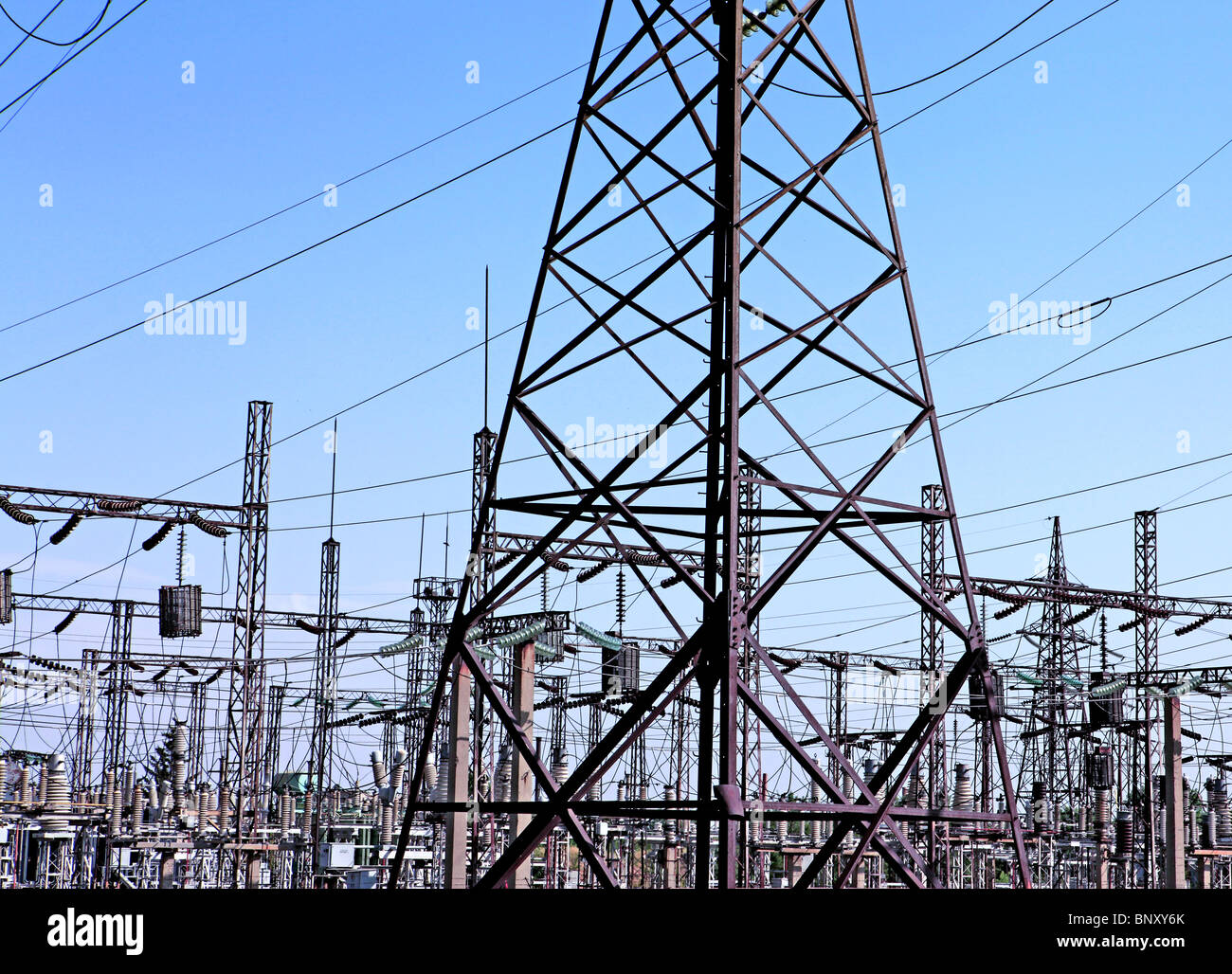 Line of high voltage electric converters equipment at a power plant ...