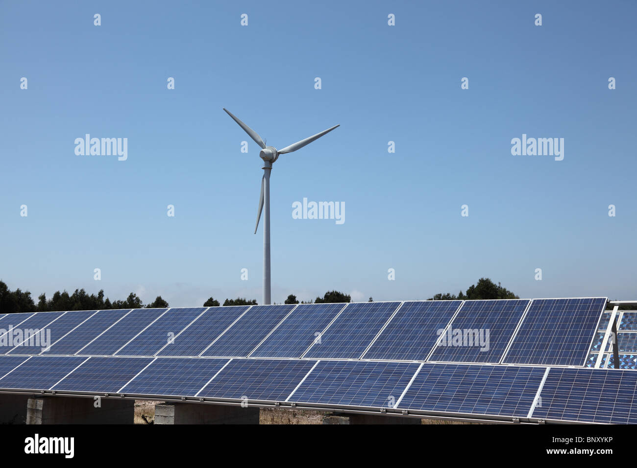 Wind turbine and photovoltaic panels for clean energy Stock Photo - Alamy