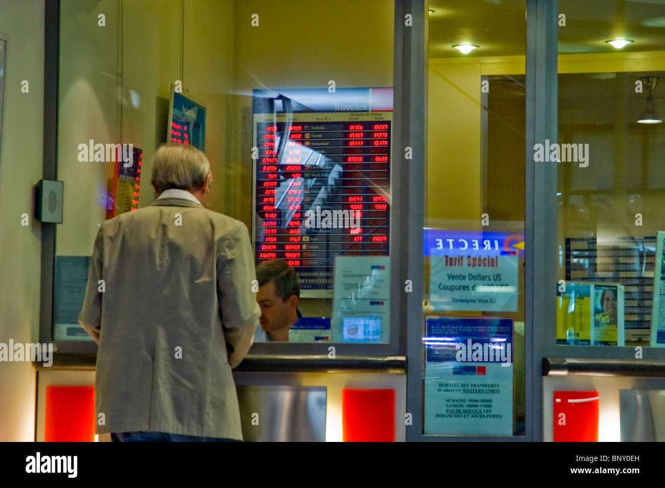 Lyon, France, inside Tra-in Station Passenger, Changing Money at Bank ...