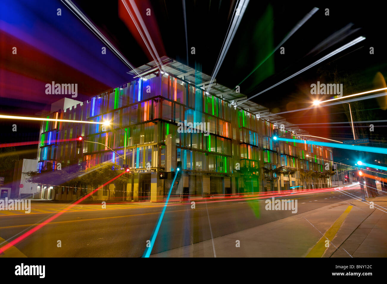 Streaked Light From a Colorful Lit Parking Garage at Night Stock Photo ...