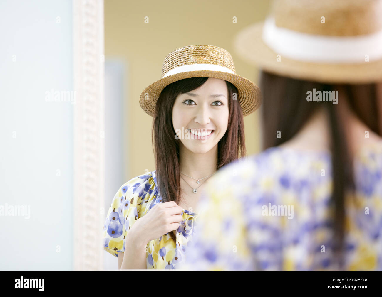 Young woman getting ready Stock Photo - Alamy