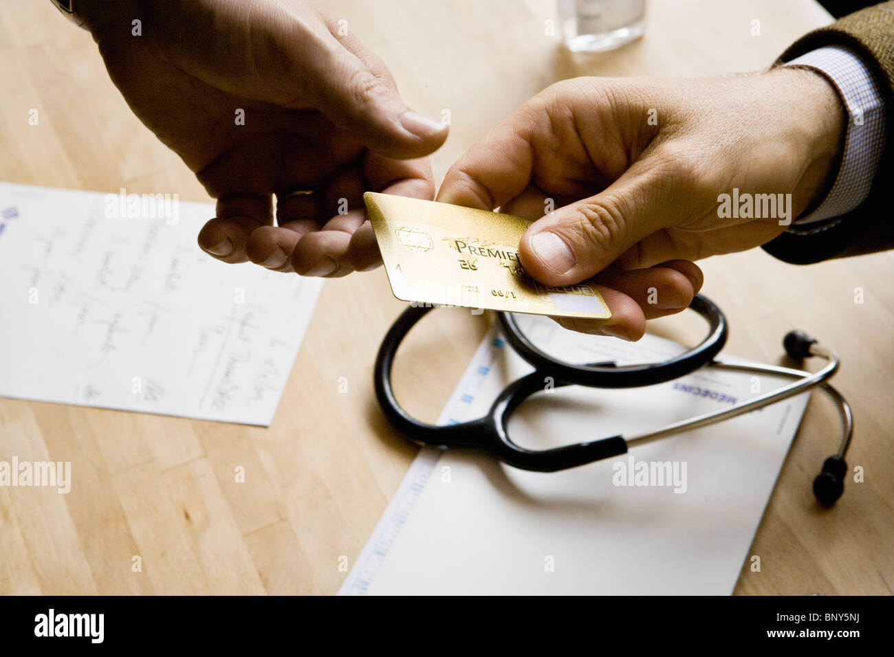 Paying for healthcare with credit card Stock Photo - Alamy