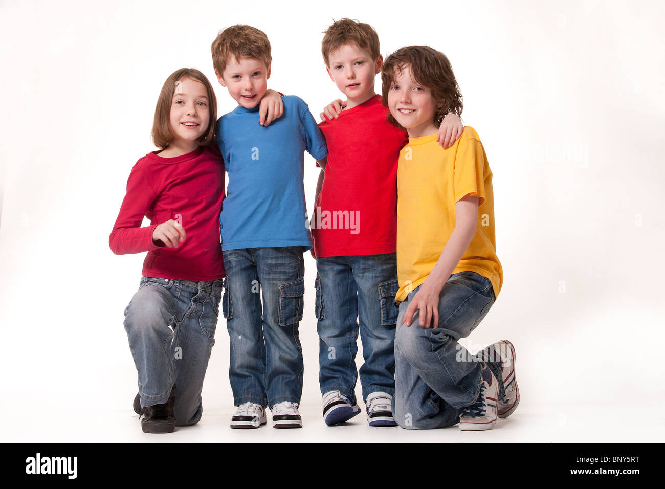 Young children isolated on a white background Stock Photo - Alamy