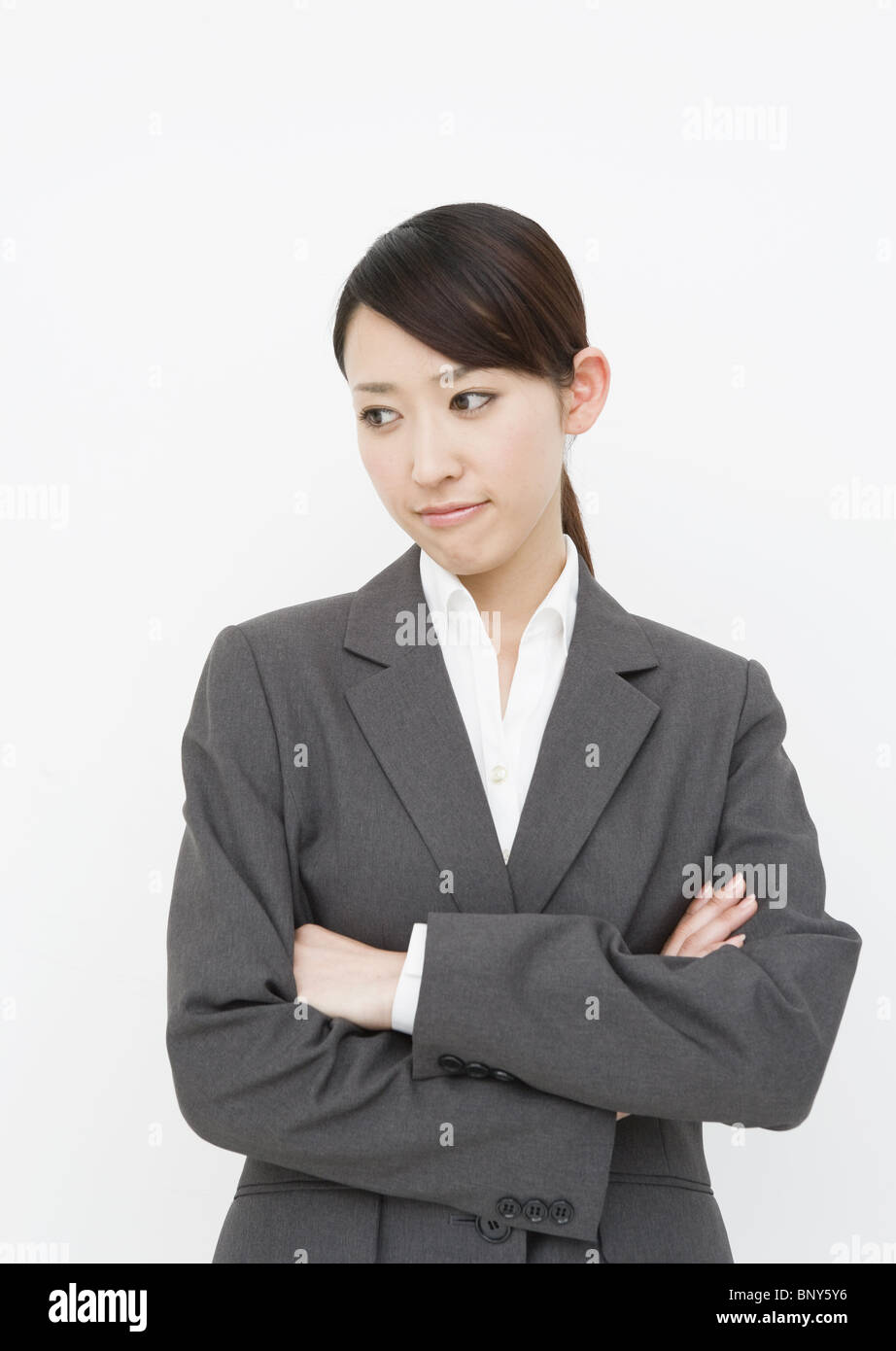 Business woman thinking Stock Photo - Alamy