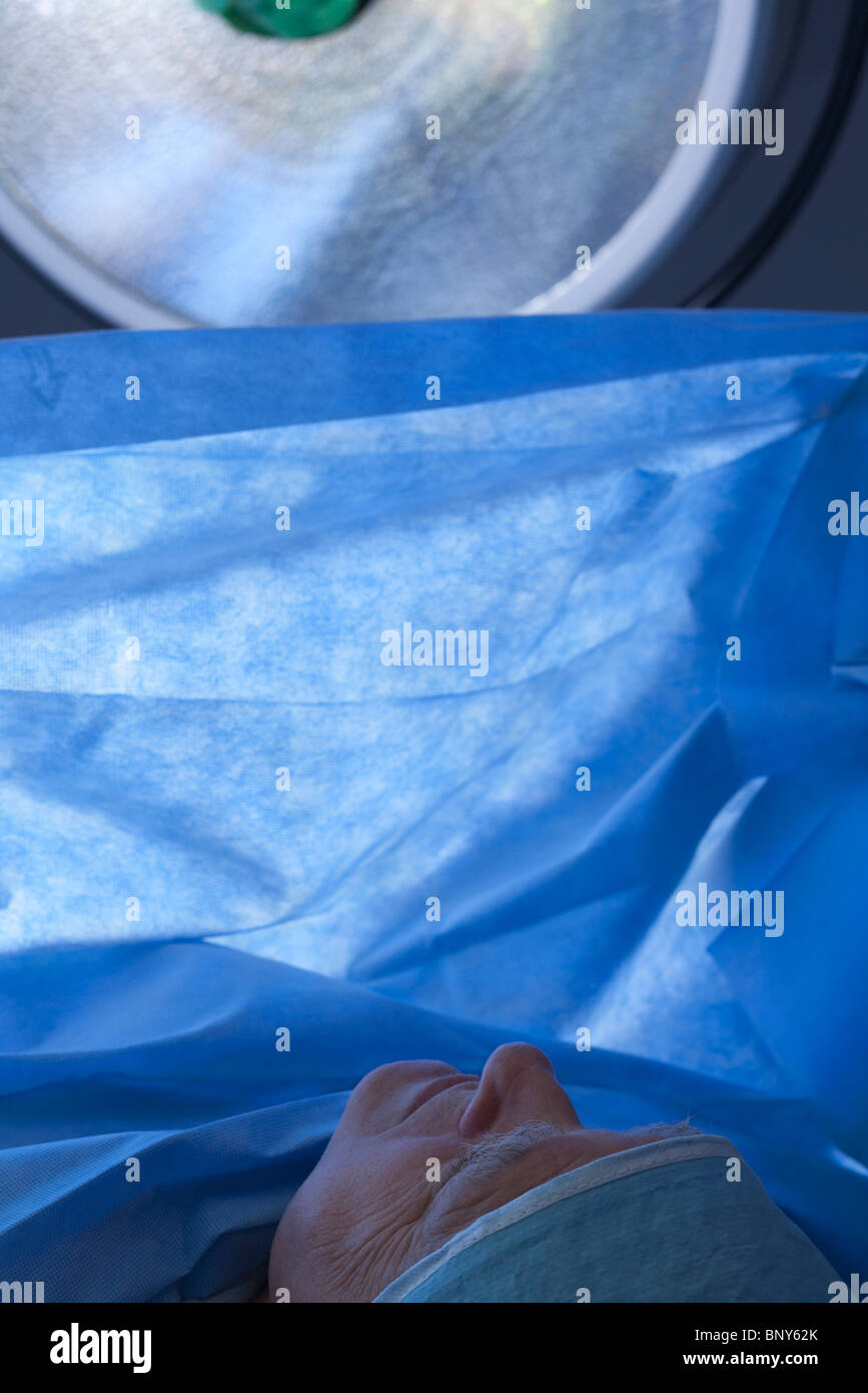 Patient in operating room Stock Photo - Alamy
