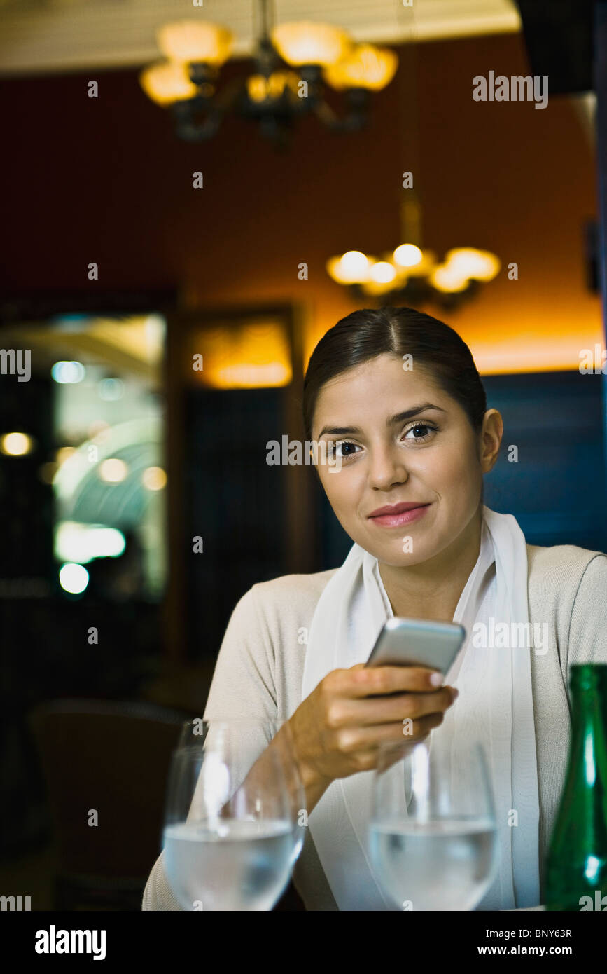 Woman with cell phone, portrait Stock Photo - Alamy