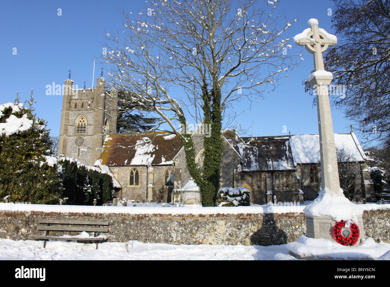 Saint Mary's Church and War Memorial, Hambleden village in the snow ...