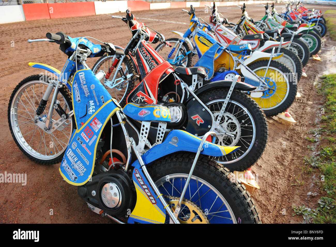 Speedway bikes are lined up on the track before racing Stock Photo - Alamy