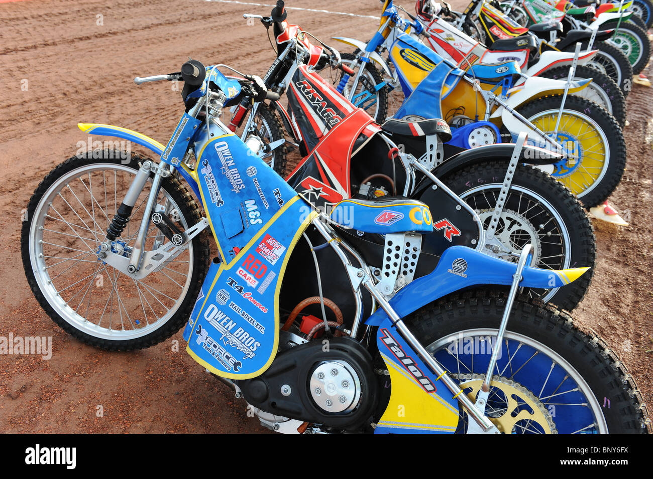 Speedway bikes are lined up on the track before racing Stock Photo - Alamy