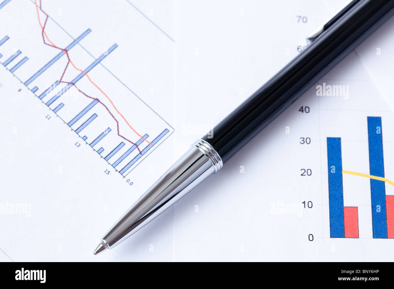 pen and business graph Stock Photo - Alamy