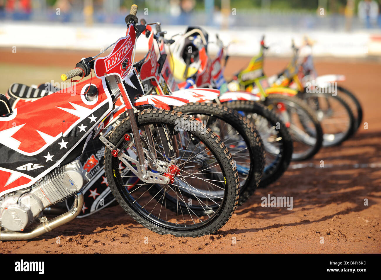 Speedway bikes are lined up on the track before racing Stock Photo - Alamy