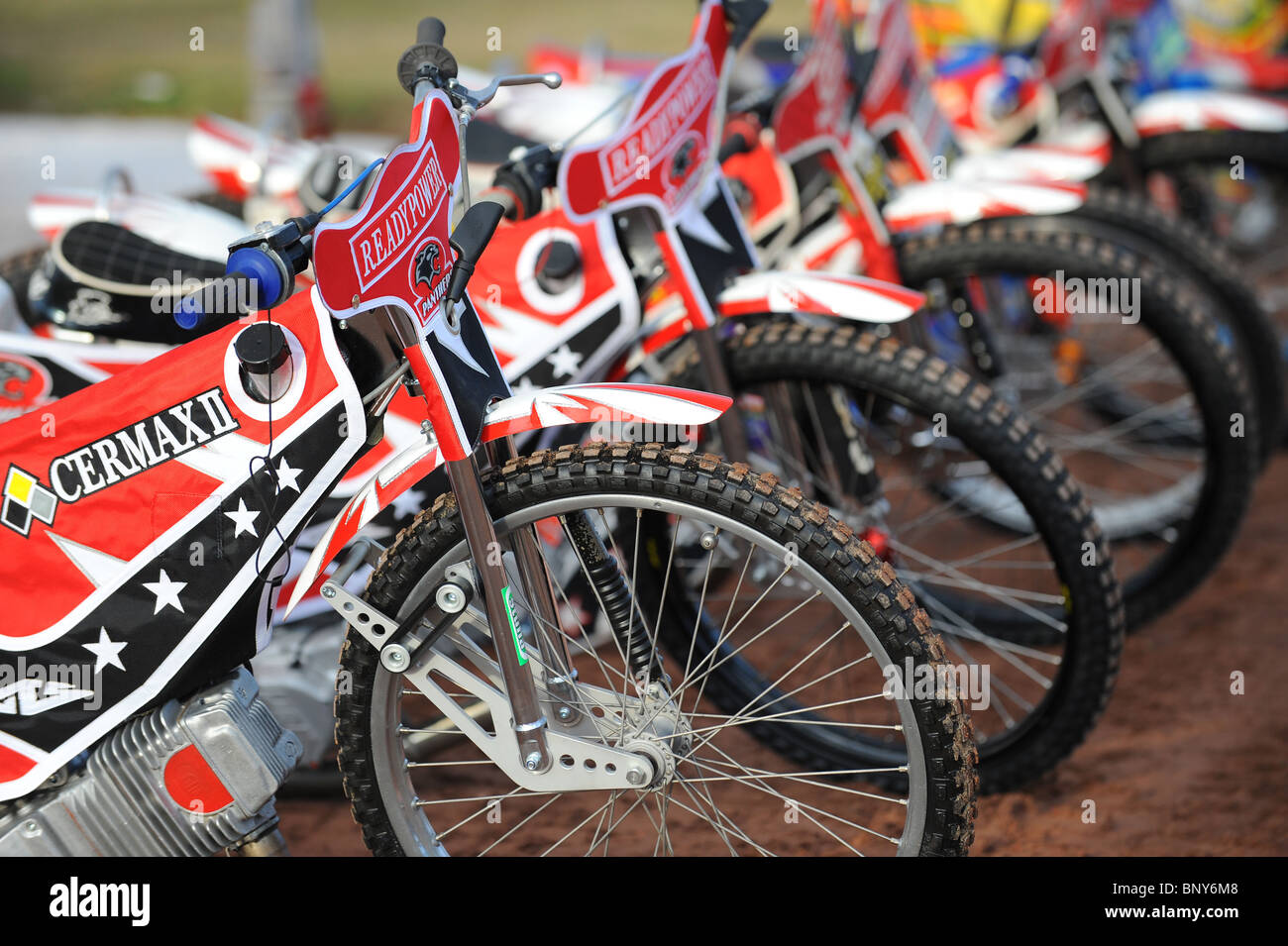 Speedway bikes are lined up on the track before racing Stock Photo - Alamy
