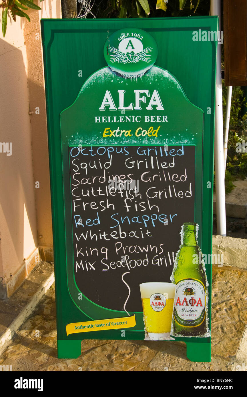 Signs outside taverna in Sidari on the Greek island of Corfu Greece GR ...