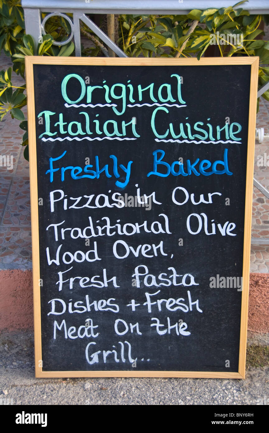 Signs outside taverna in Sidari on the Greek island of Corfu Greece GR ...
