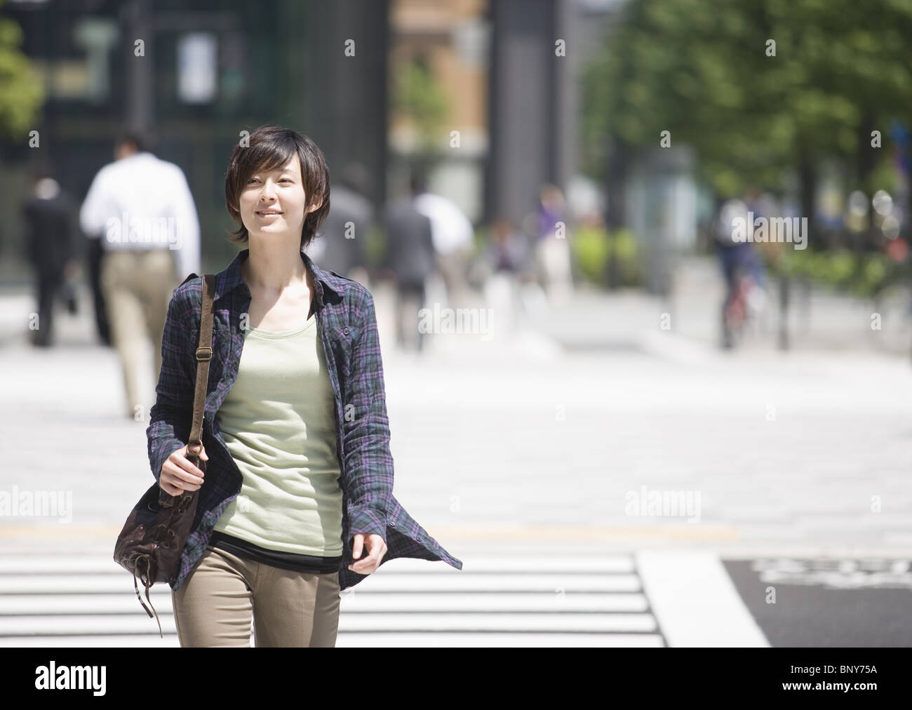 Young woman in street Stock Photo - Alamy