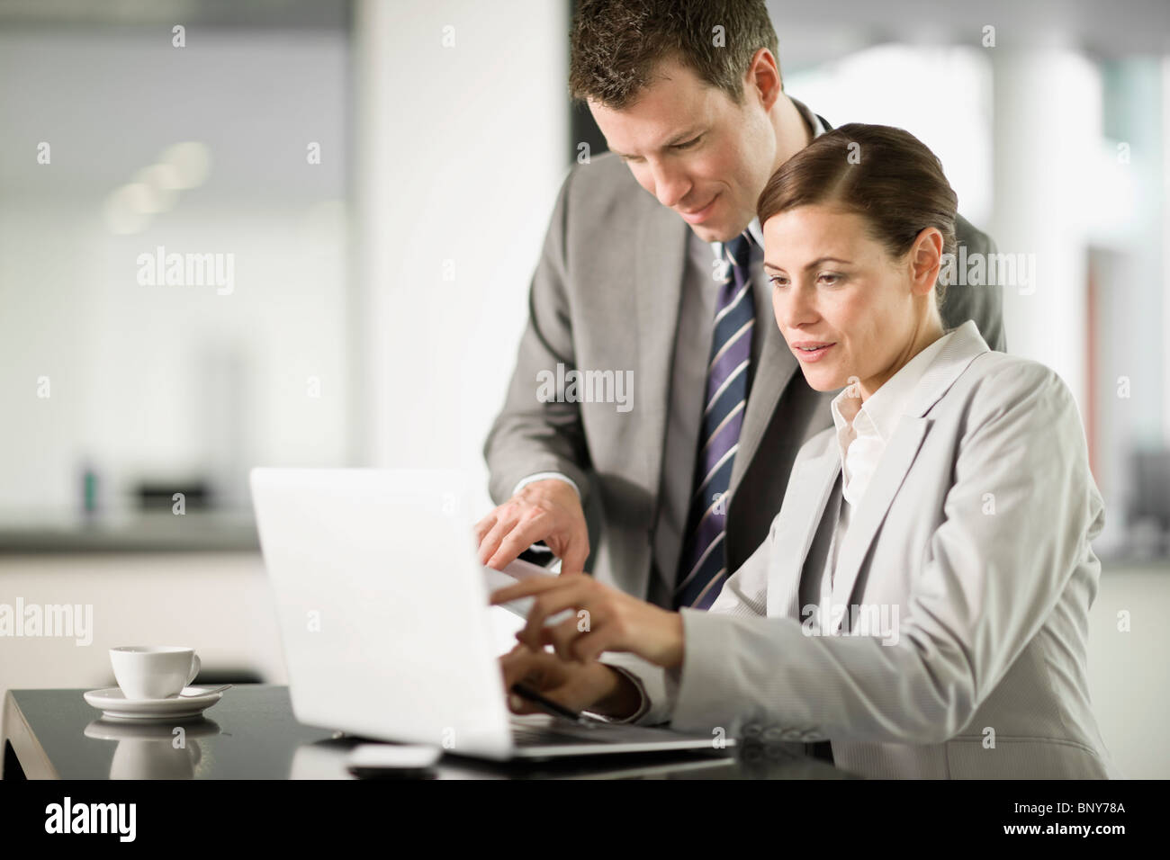Woman and man at work Stock Photo - Alamy