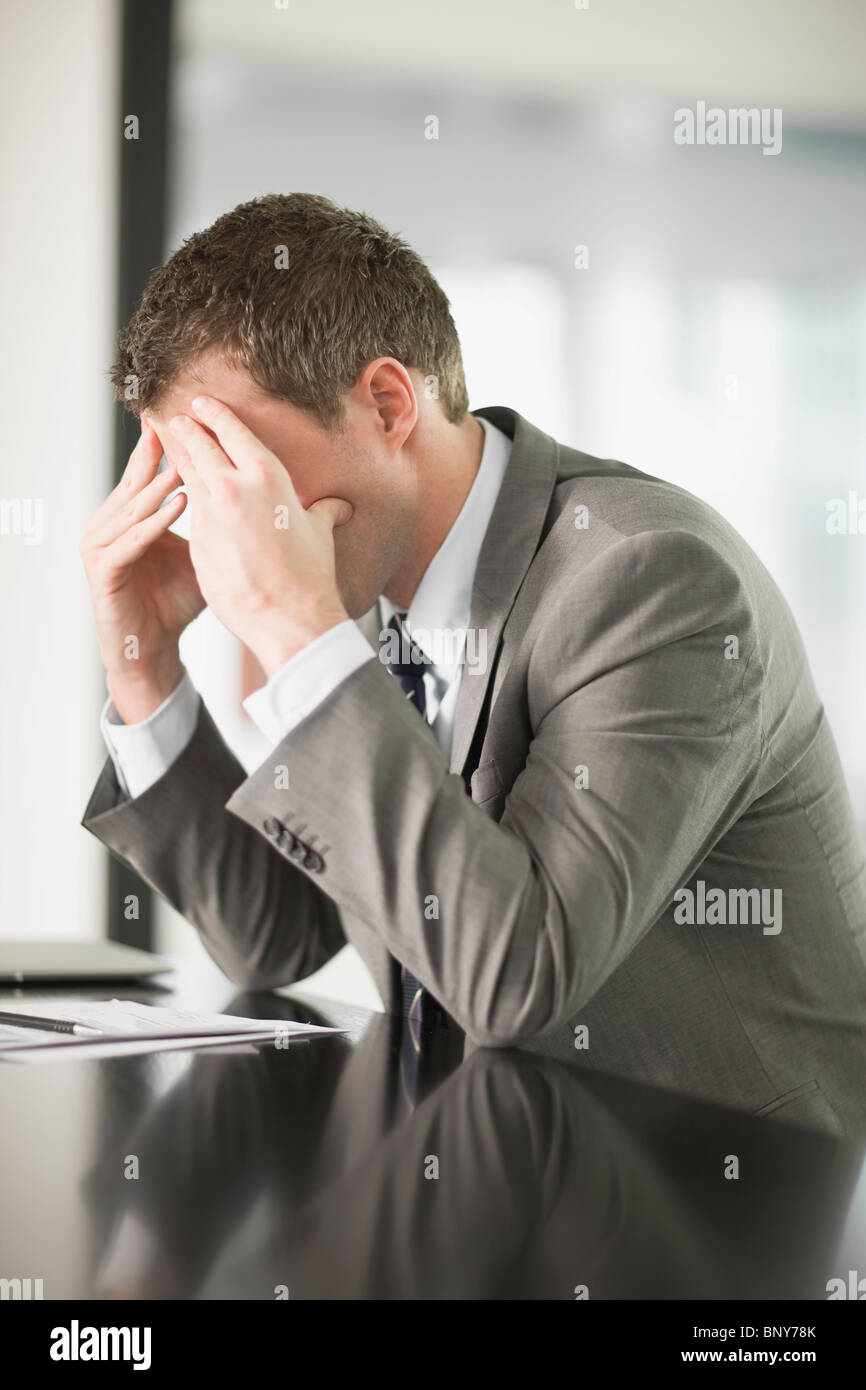 Desperate business man Stock Photo - Alamy