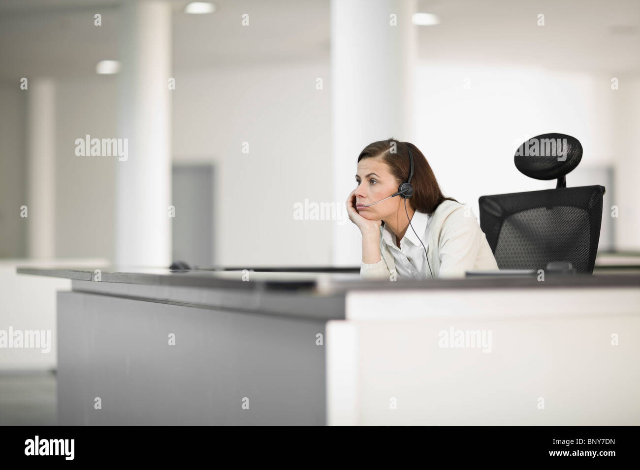 Unhappy receptionist hi-res stock photography and images - Alamy