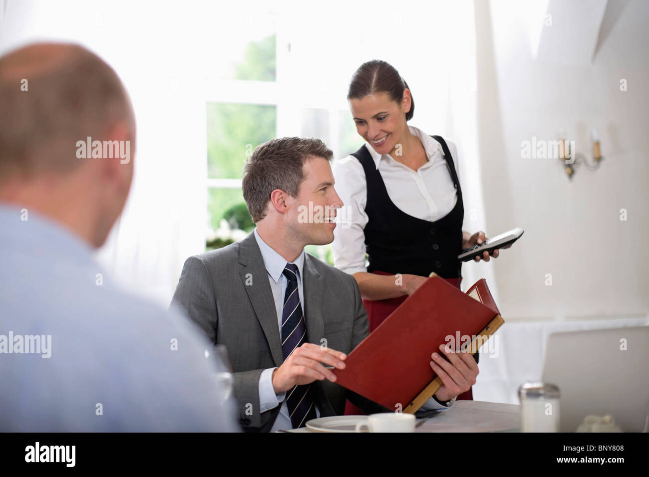 Man in a restaurant Stock Photo - Alamy