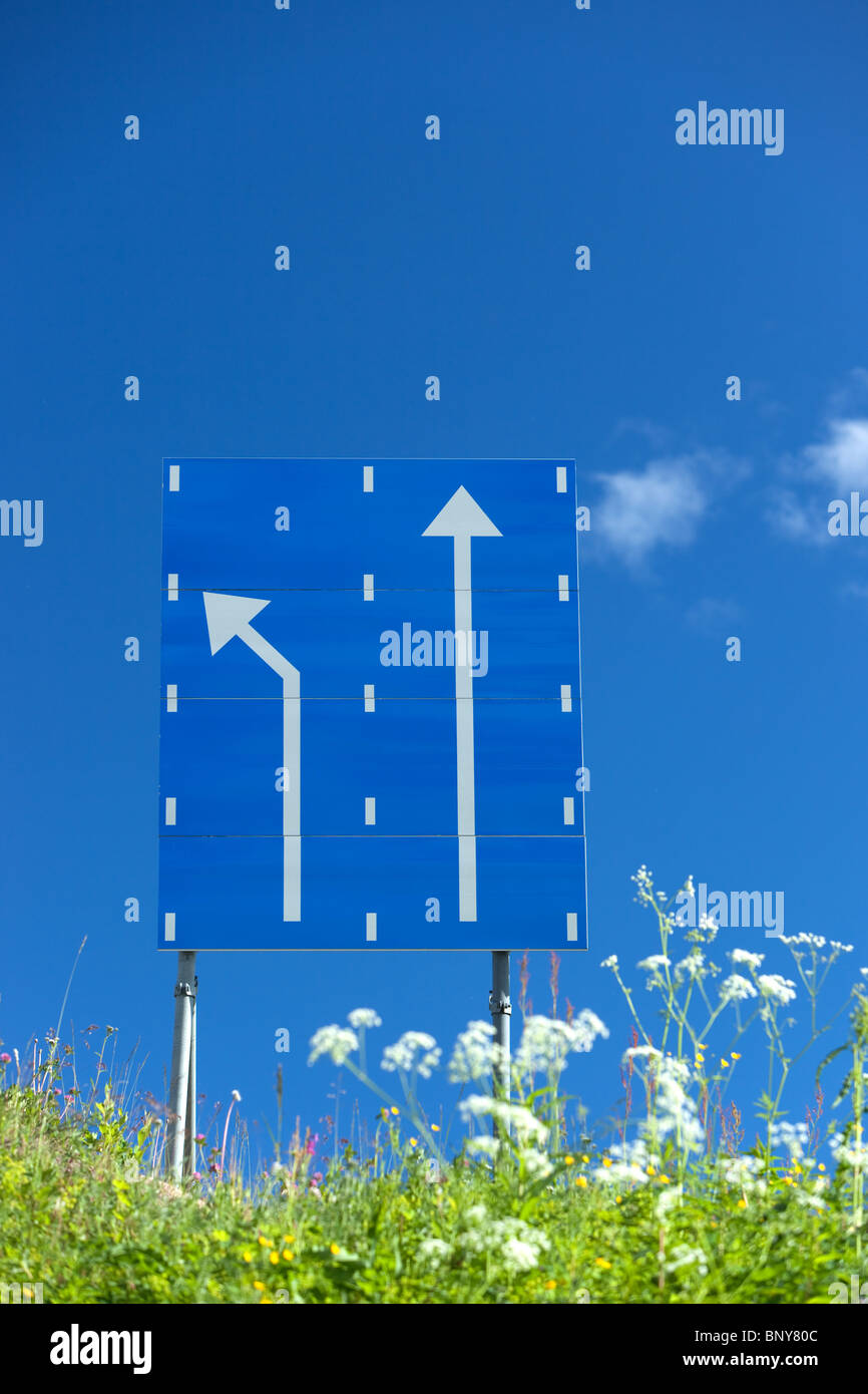 Road traffic sign two arrows hi-res stock photography and images - Alamy