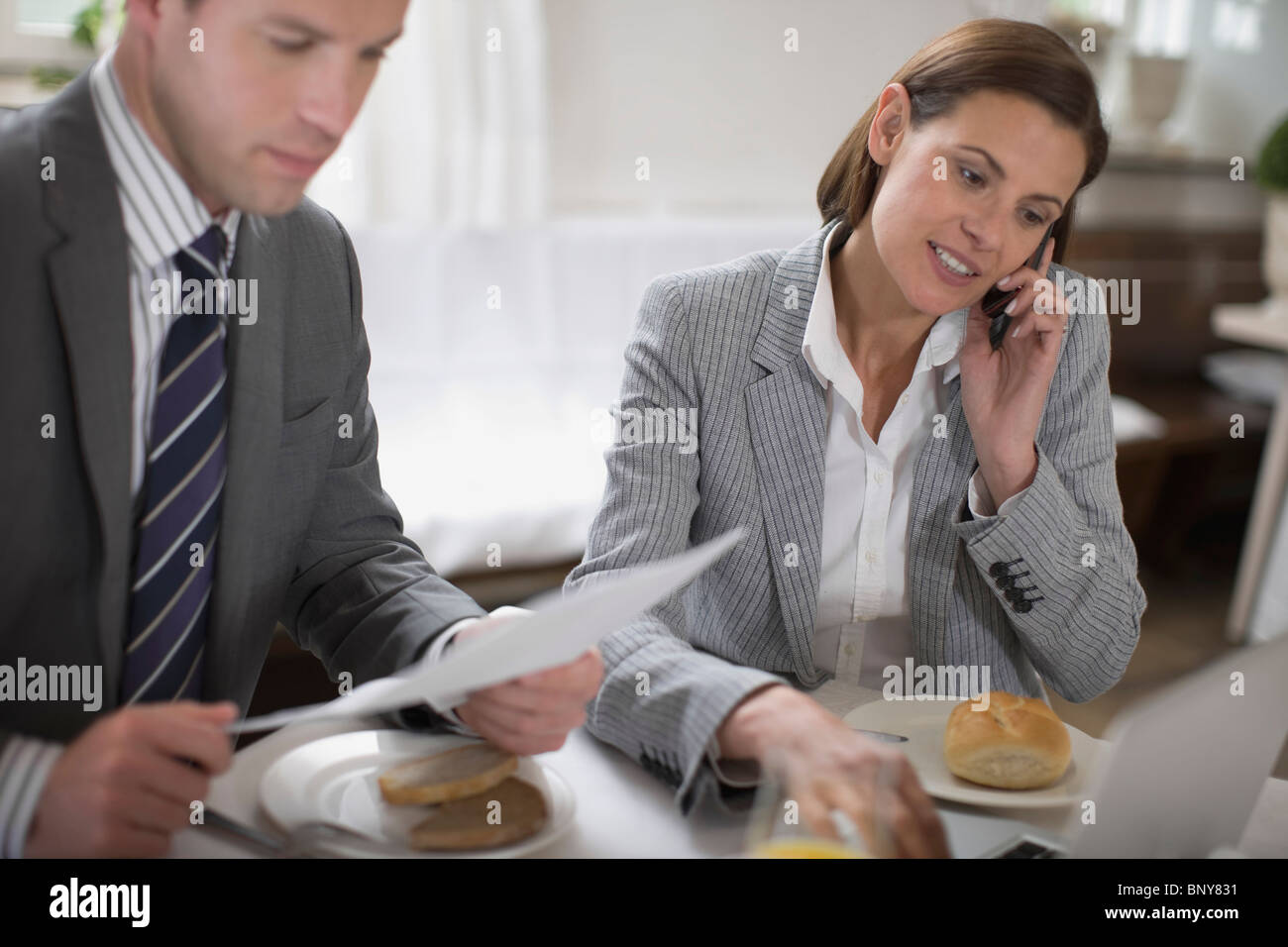 Business people having breakfast Stock Photo - Alamy
