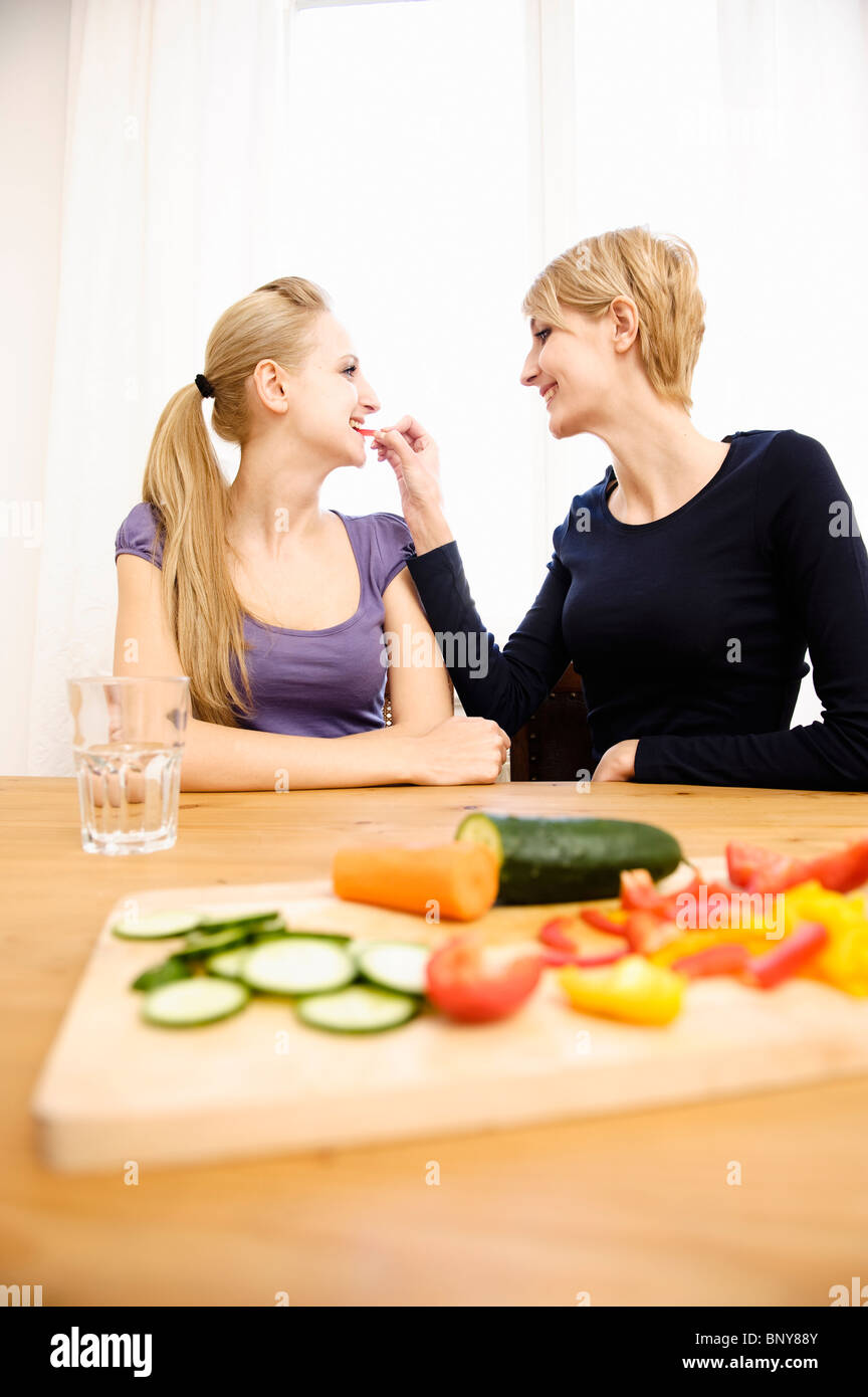 Woman biting fresh carrot hi-res stock photography and images - Alamy