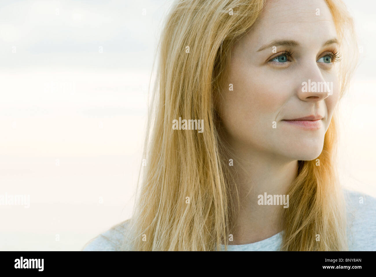 Woman looking away, portrait Stock Photo - Alamy