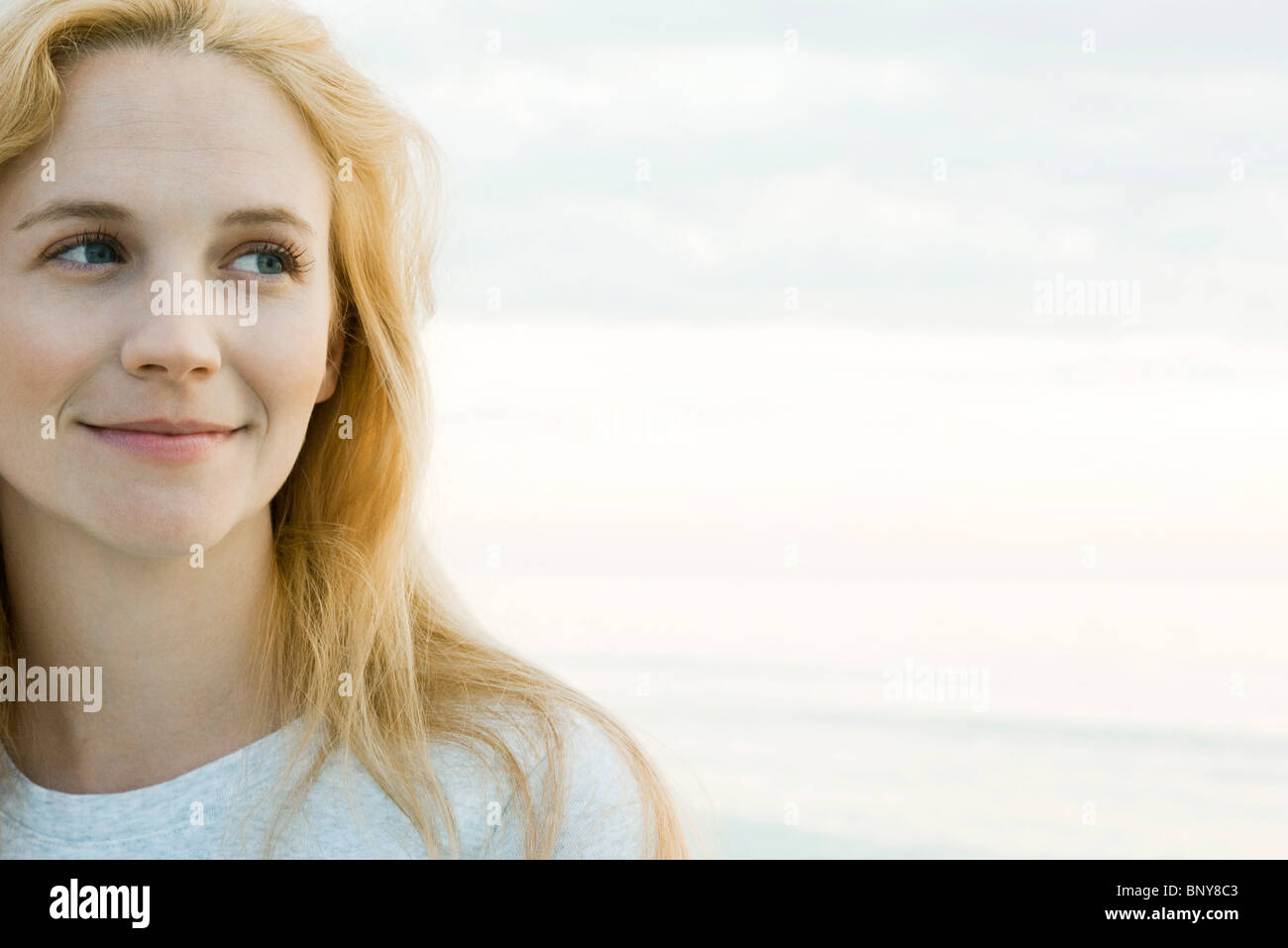 Woman at the beach, portrait Stock Photo - Alamy