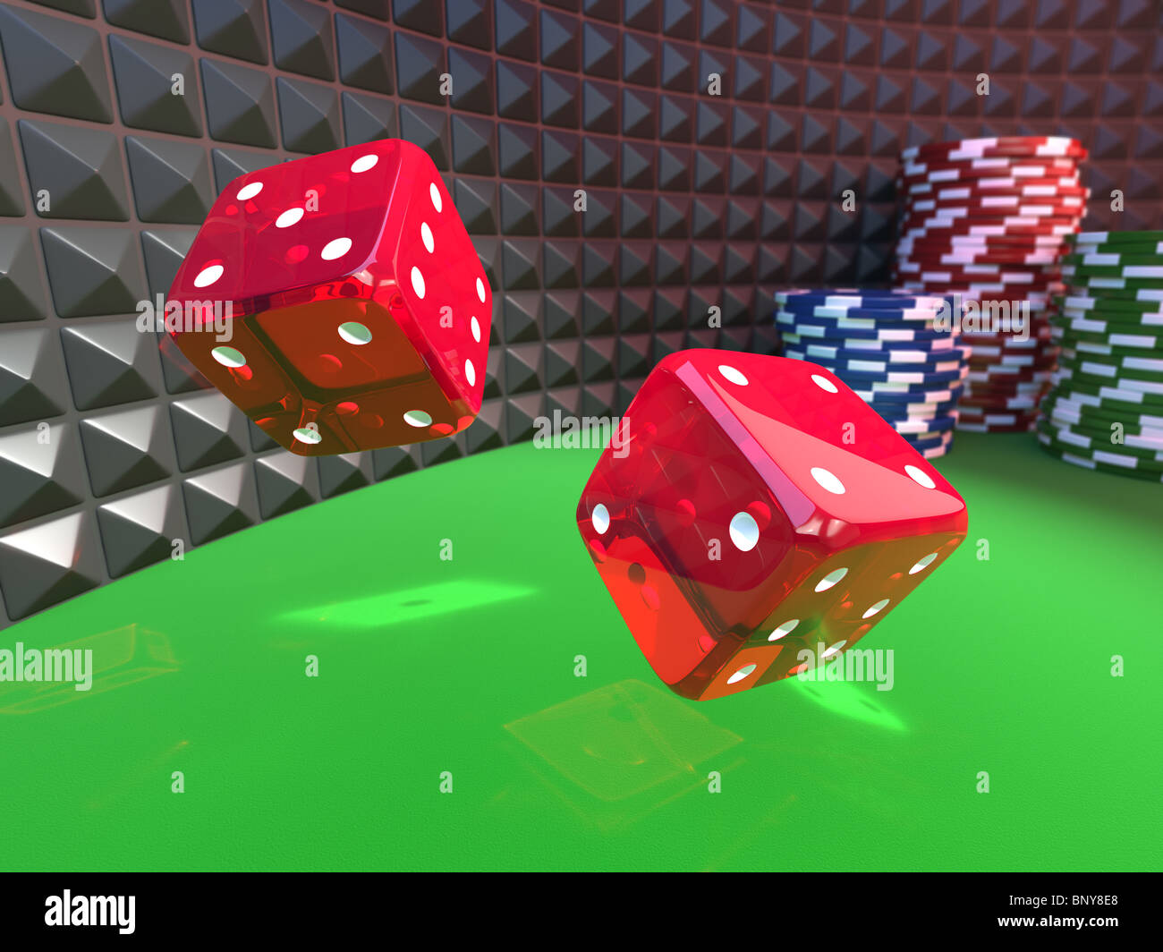 two dices rolling on a green casino table with chips on the background ...