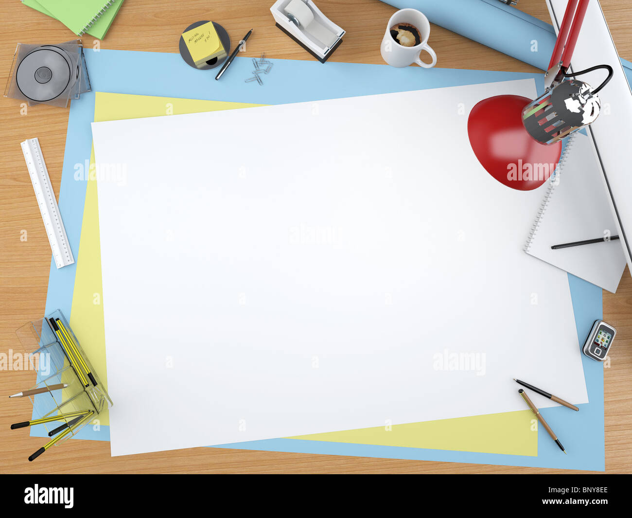 top view of a designer drawing table with lots of stationary items and ...