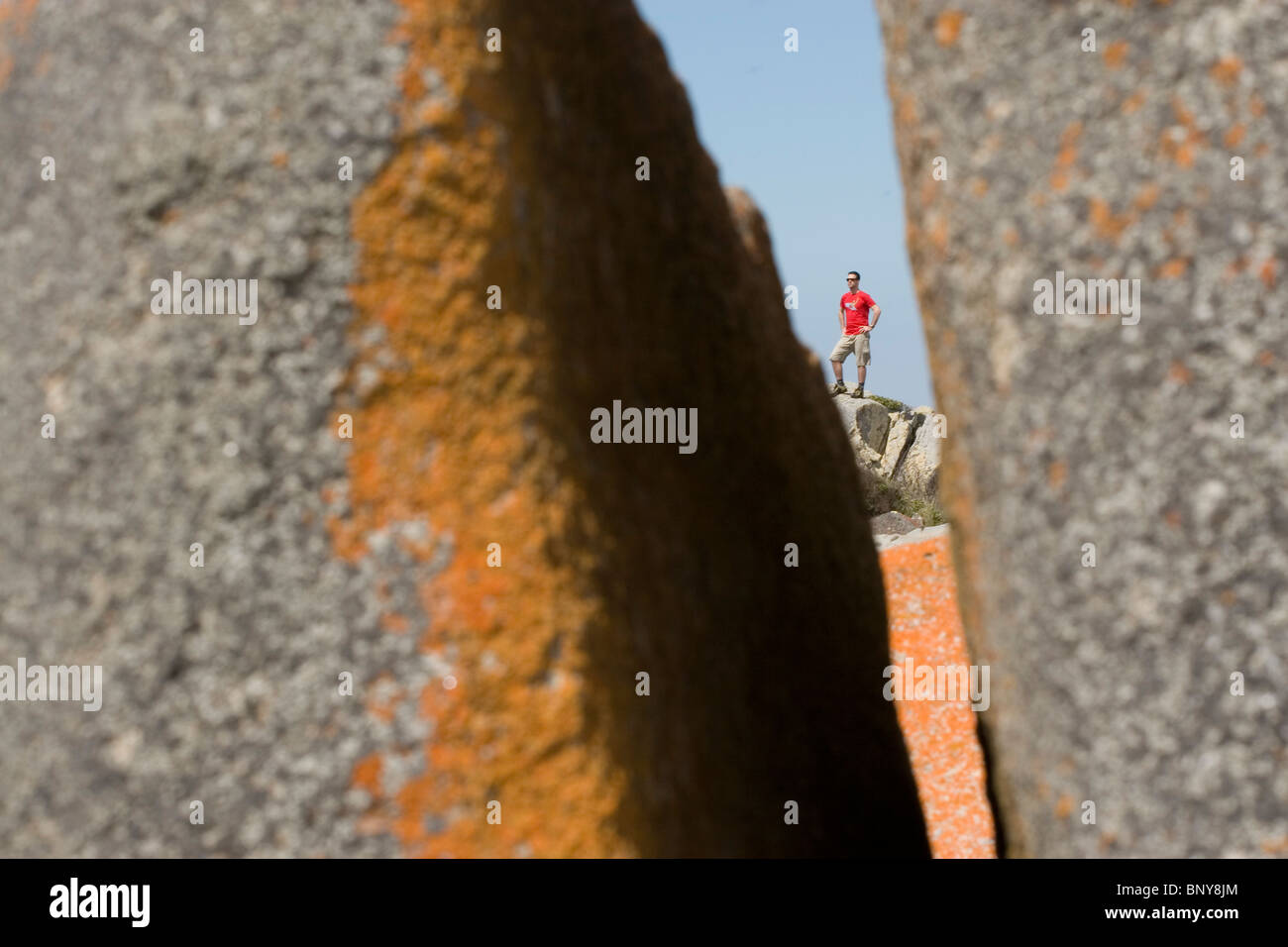 Red distant figure hi-res stock photography and images - Alamy