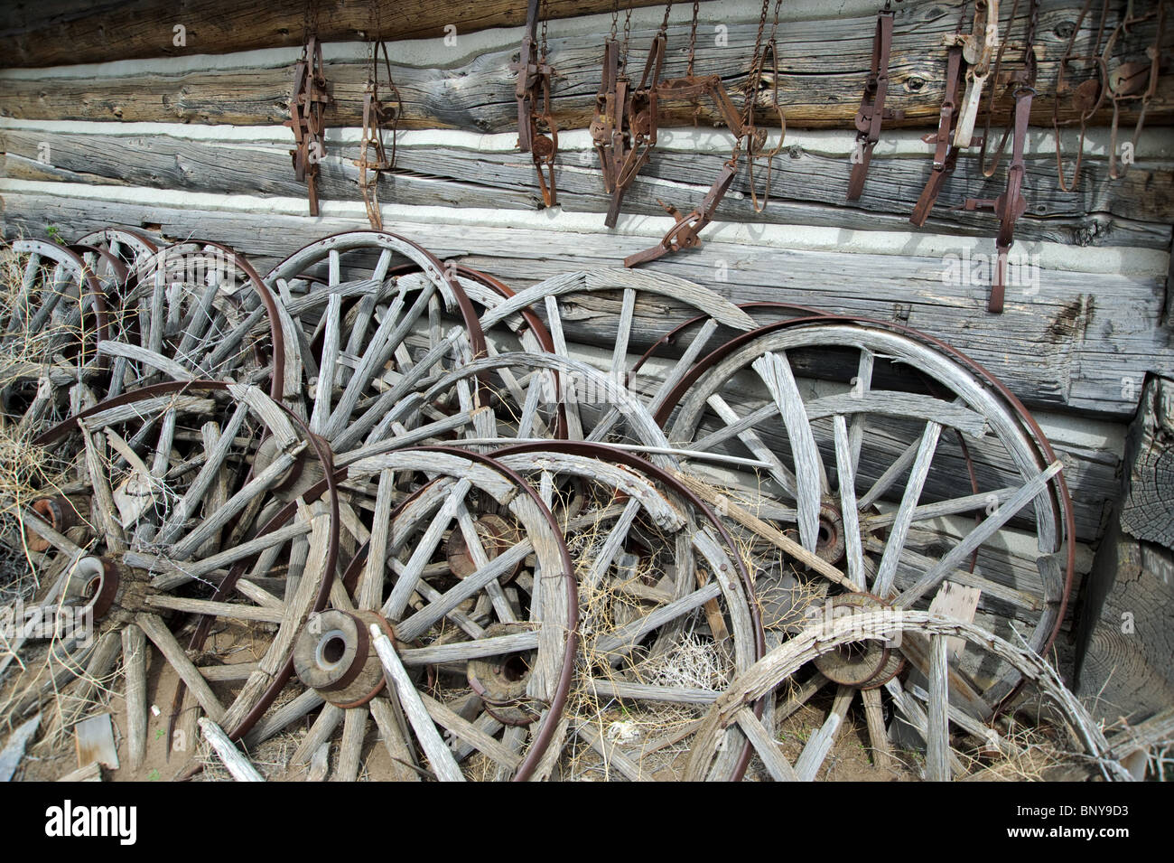 Stack of wheels used for wagons Stock Photo - Alamy