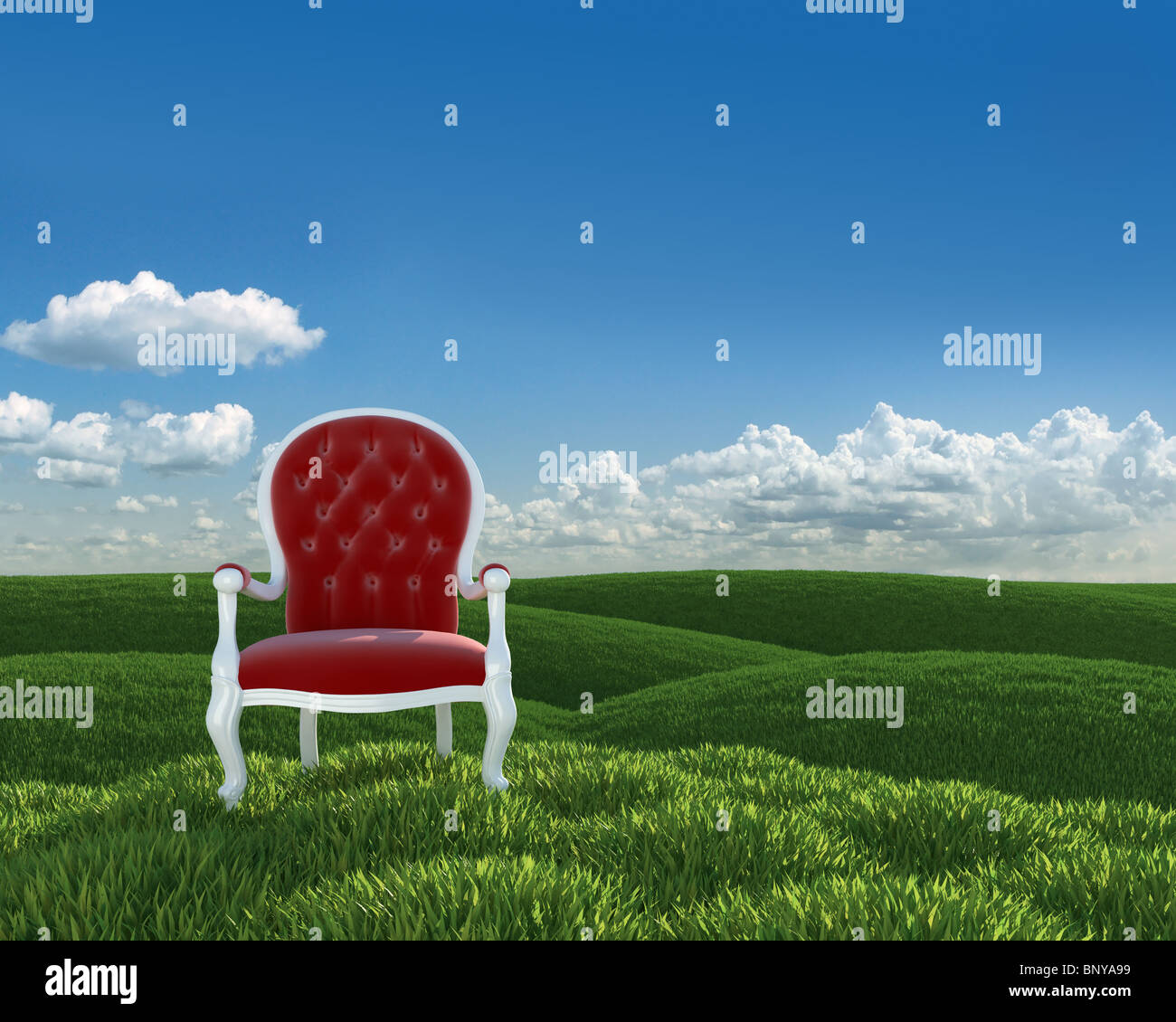 red velvet classic armchair in a green meadow of grass Stock Photo - Alamy