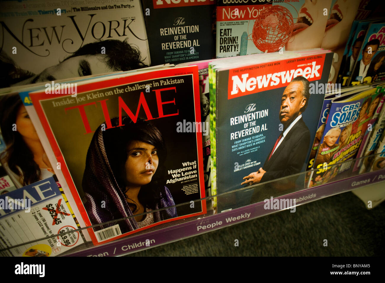 A copy of Newsweek, with Time and other magazines, is seen on a ...