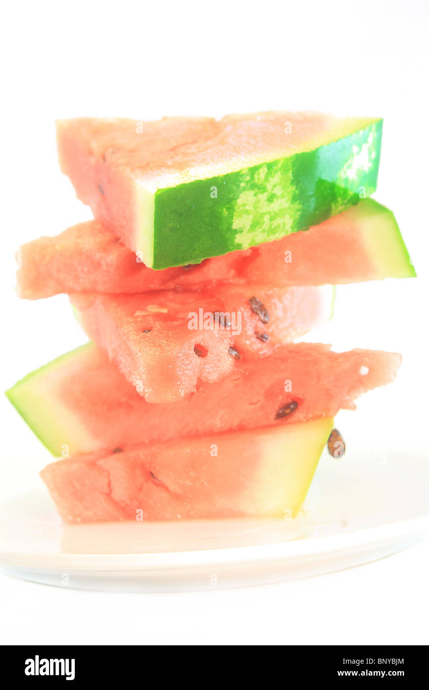 Watermelon wedges, in close-up, with white background Stock Photo - Alamy