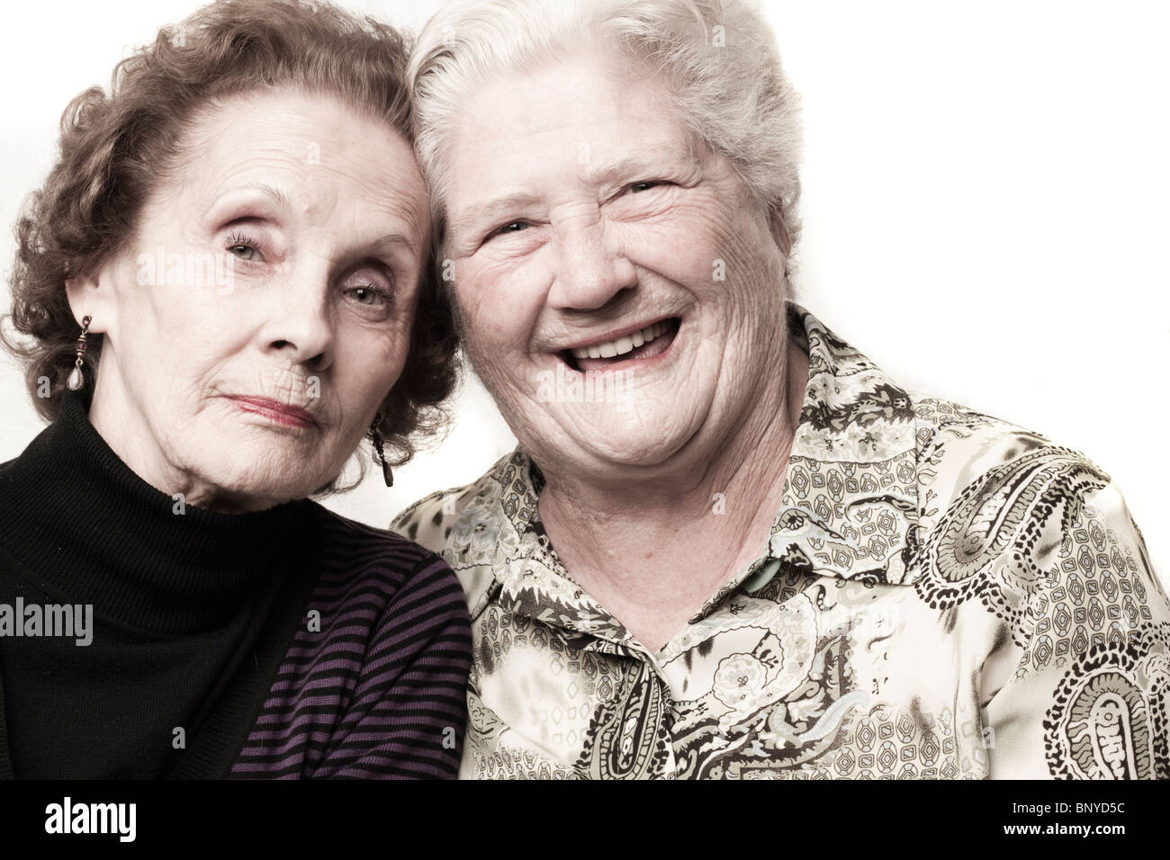 Two senior sisters laughing hi-res stock photography and images - Alamy