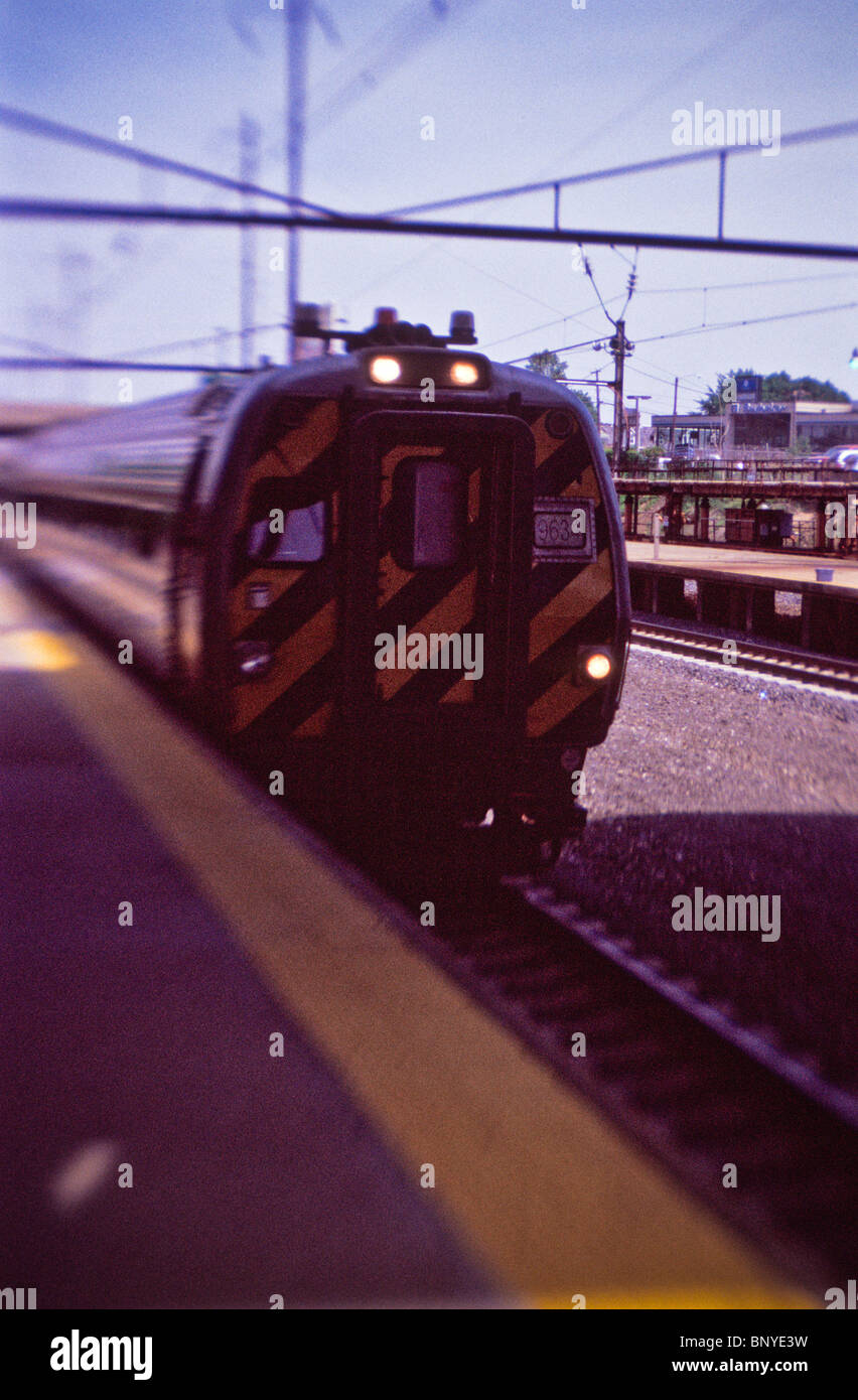 Amtrak commuter train arrives. Electric wires Stock Photo - Alamy