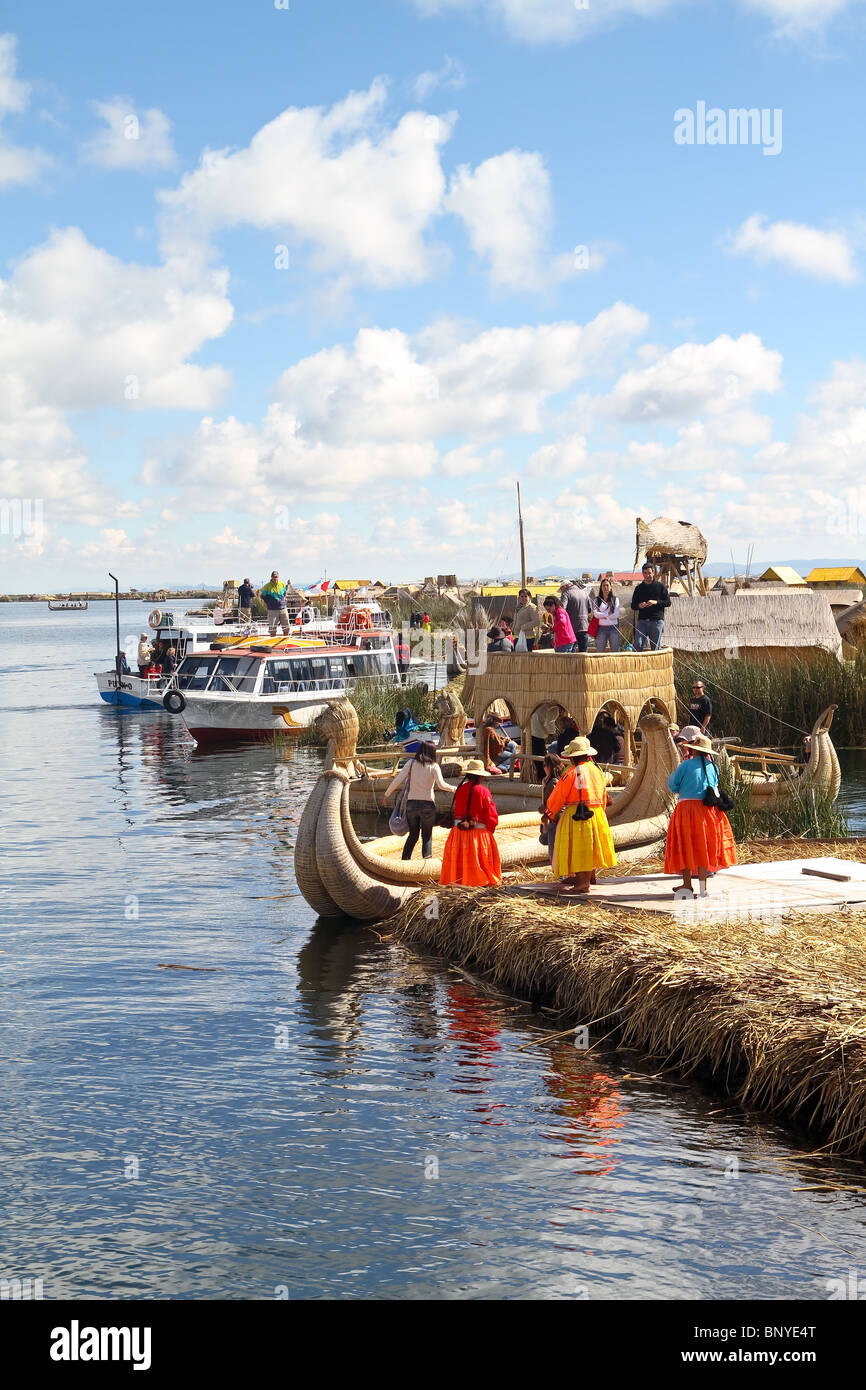 Uros people living on the floating islands of the Lake Titicaca in Peru ...