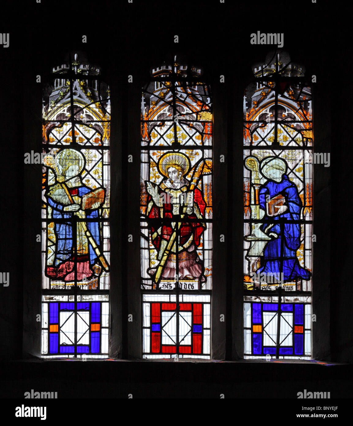 A 16th century stained glass window depicting Saints Cuthbert, Chad and ...
