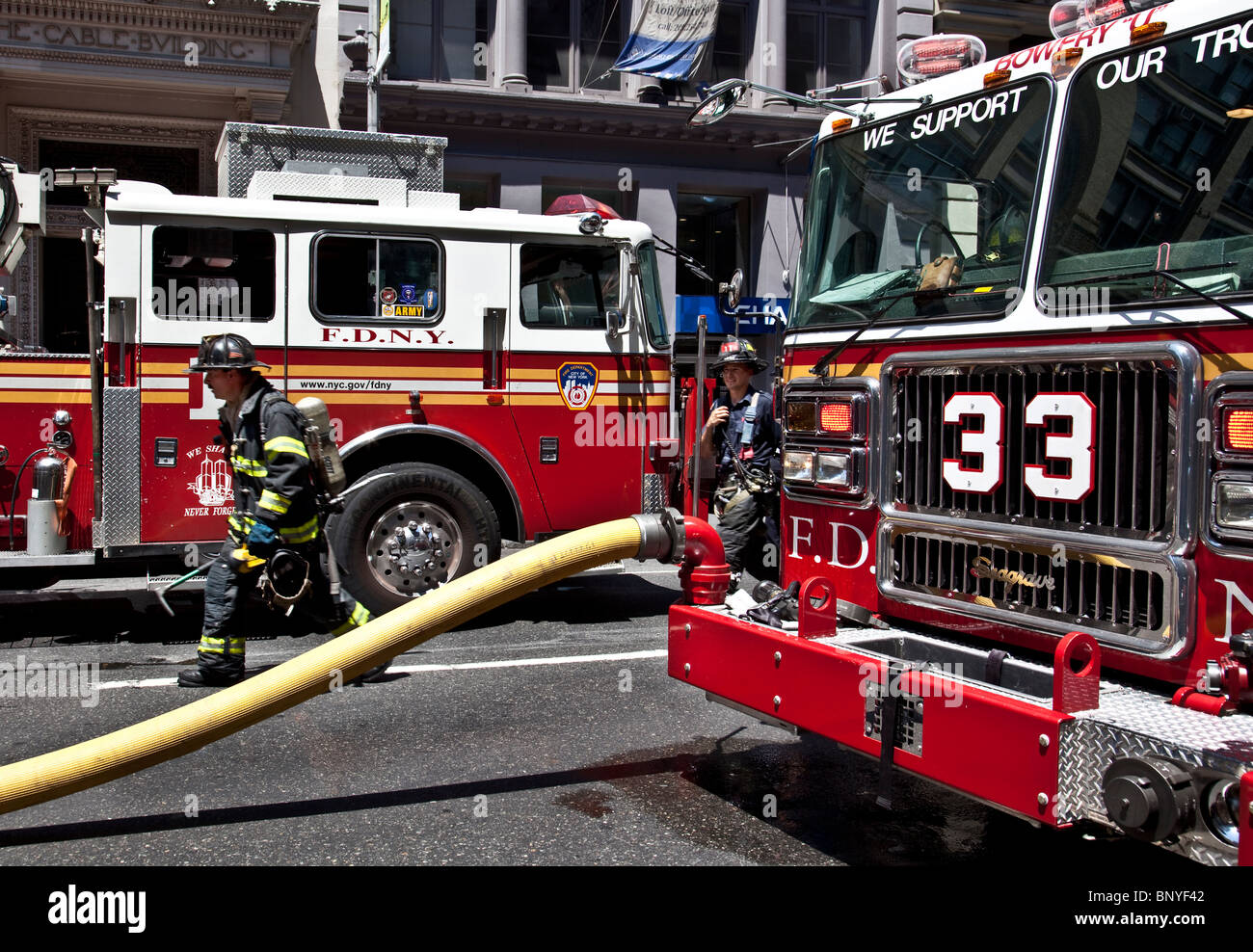 FDNY Fire engines at the scene of a building fire Stock Photo - Alamy