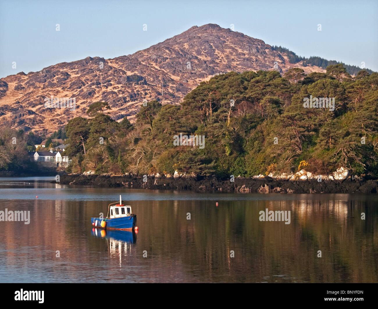 A fishing boat anchored in Glengarriff Harbour, Bantry Bay, County Cork ...