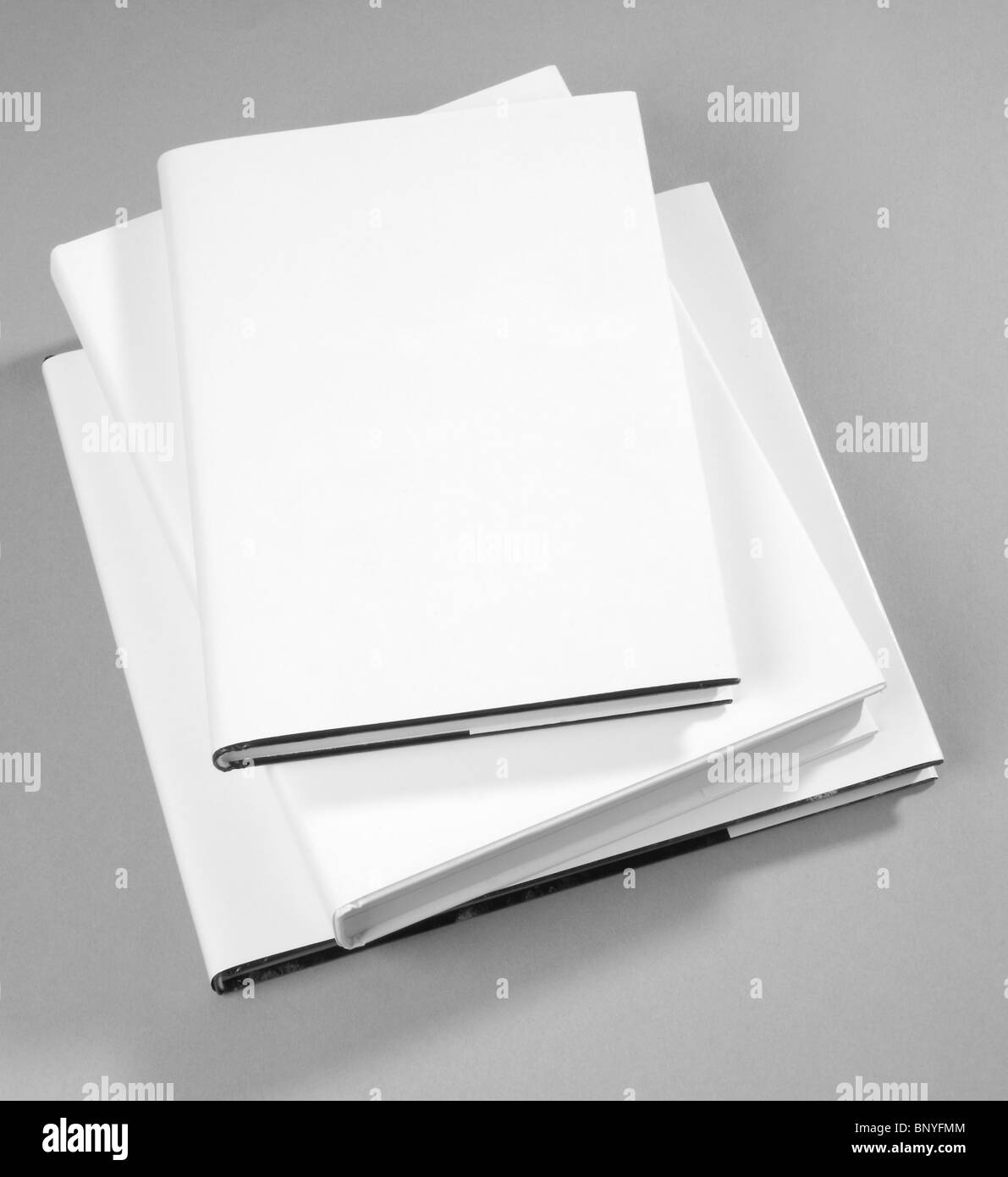 Three Blank book cover white Stock Photo - Alamy
