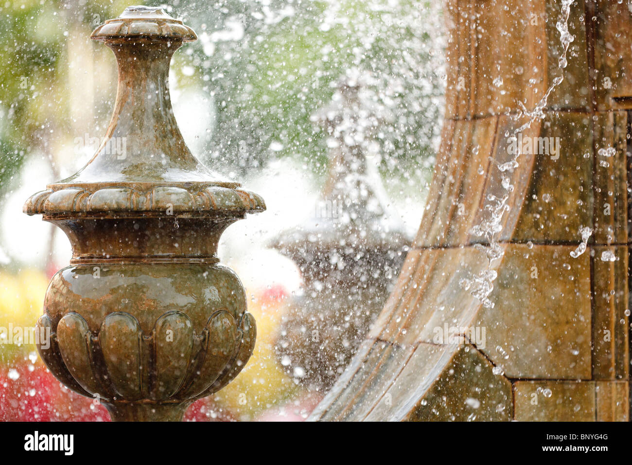 high shutter speed picture of city fountain Stock Photo - Alamy